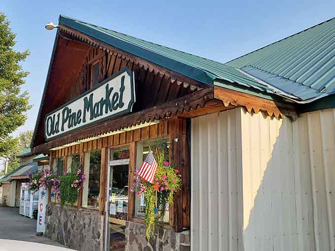 The Old Pine Market's decorative trim and hanging baskets prove small-town charm isn't just nostalgia, it's intentional.