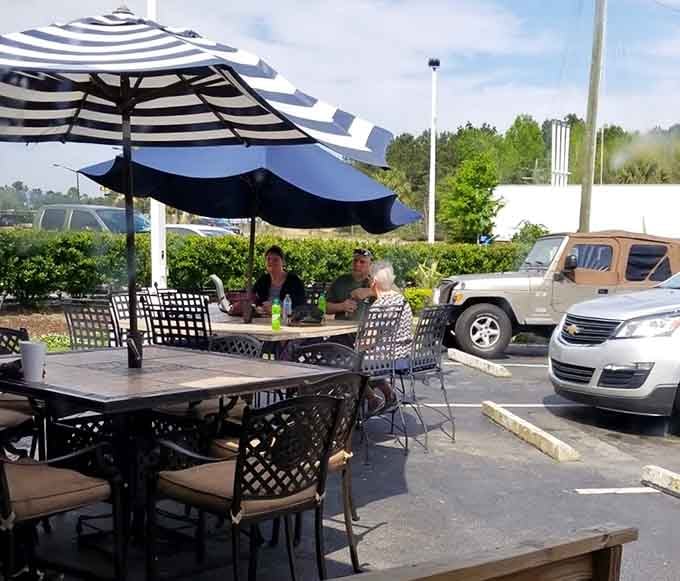 Outdoor seating with umbrellas means you can enjoy your feast while pretending you're getting some fresh air too.