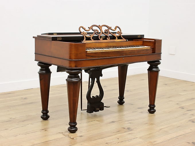 A beautifully preserved pump reed organ that deserves a parlor, a candelabra, and a dramatic pianist.