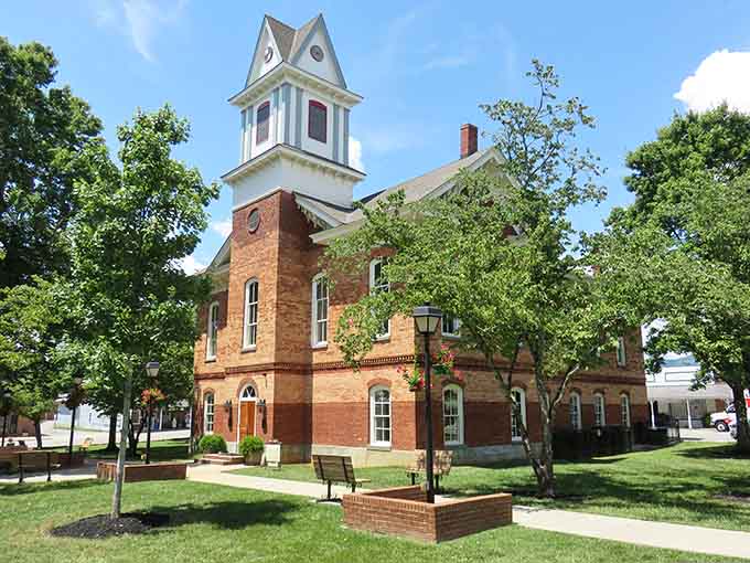 The Old Clay County Courthouse stands proud, its Victorian tower watching over generations of mountain justice.