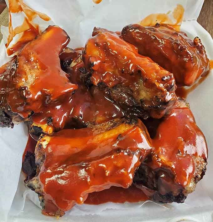 Ribs glazed to perfection, proving Hickory Hut's talents extend far beyond their famous fowl.