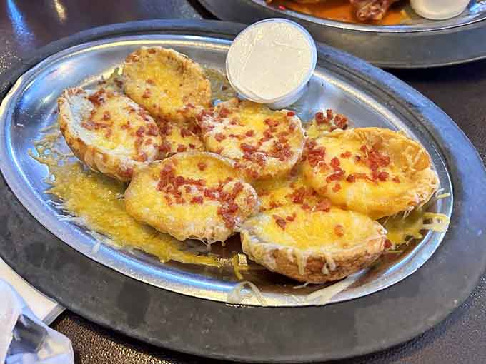 Potato skins loaded with cheese and bacon because sometimes vegetables need proper encouragement to be eaten.