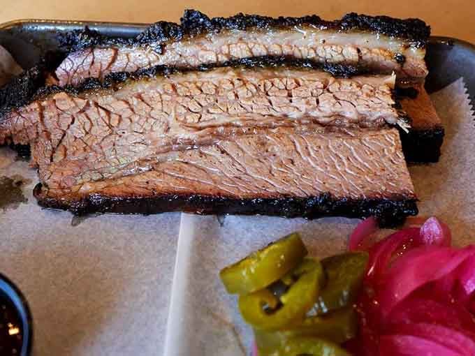 That smoke ring and bark on the brisket are basically nature's way of saying "you're welcome."