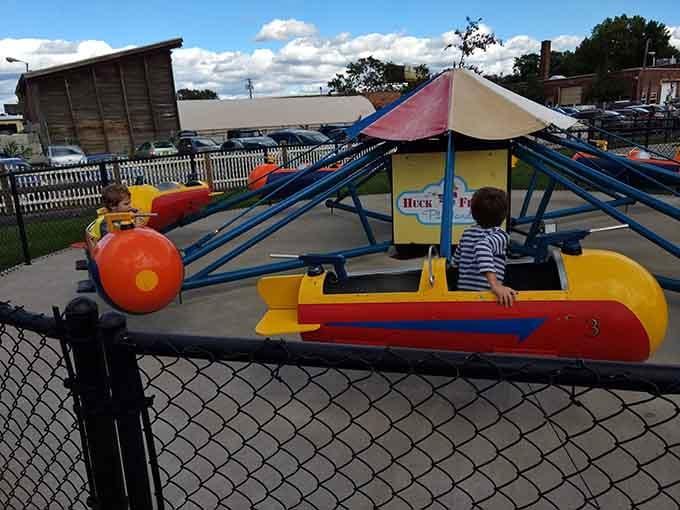Rocket ships launch young astronauts skyward, proving that space travel is way more fun without the actual danger.