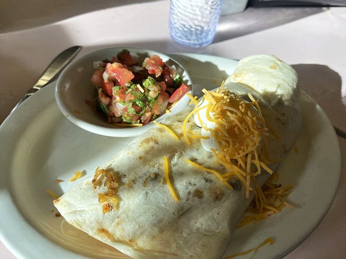 Breakfast burrito loaded with the good stuff, wrapped tight enough to actually stay together while you eat it.