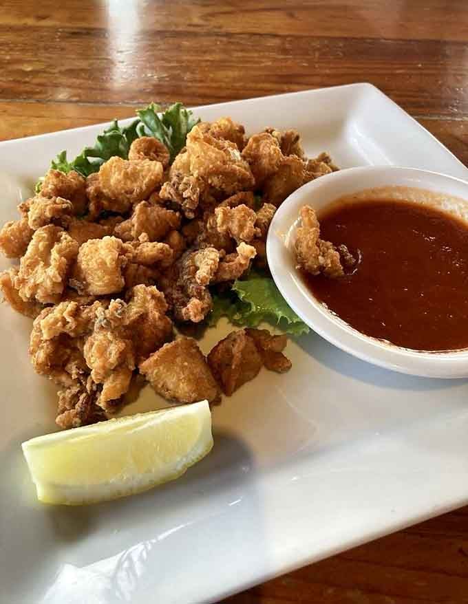 Fried calamari with cocktail sauce: proof that good things really do come in crispy, golden packages.