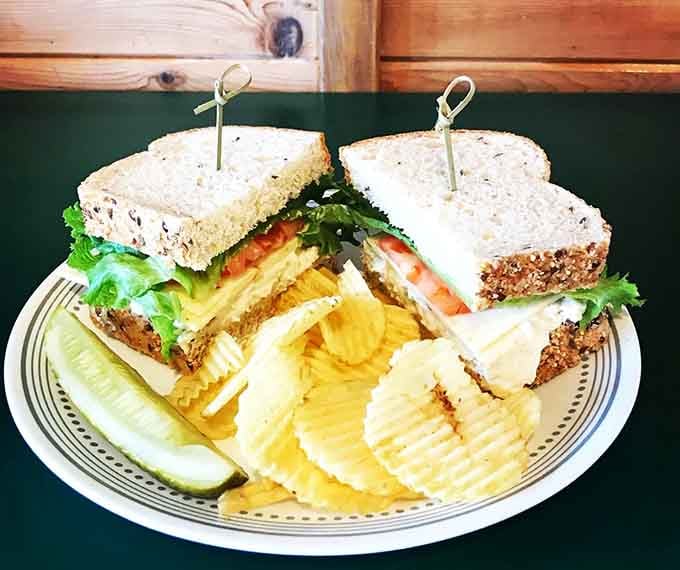 Chicken salad on artisan bread with chips, because sometimes lunch needs to look as good as it tastes.