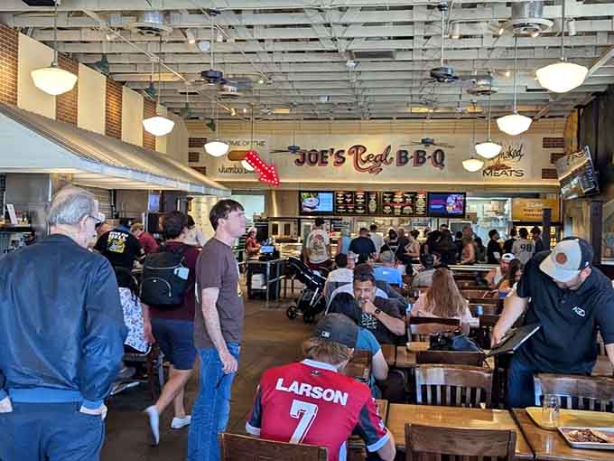 Packed dining room, happy faces, and trays loaded with meat tell the real story of Joe's success.