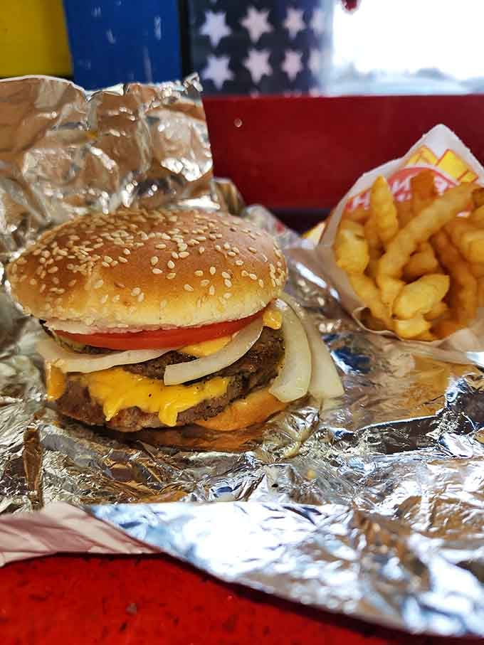 A triple cheeseburger on a sesame seed bun with crispy fries is the kind of lunch that makes you forget all about counting calories.