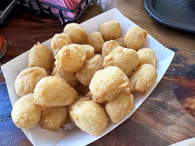 Those golden scallops are so perfectly breaded, they look like little edible treasures from the deep.