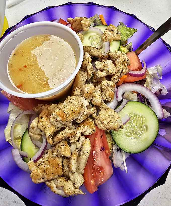 When your salad comes with this much chicken, you can almost pretend you're being healthy. Almost.