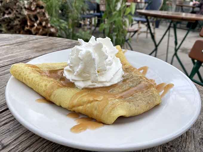 Delicate cr&ecirc;pes drizzled with caramel and topped with whipped cream make you wonder why every meal can't end this way.