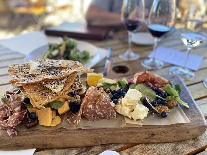Artisan crackers, cured meats, and cheese create a board that's prettier than most people's holiday decorations.