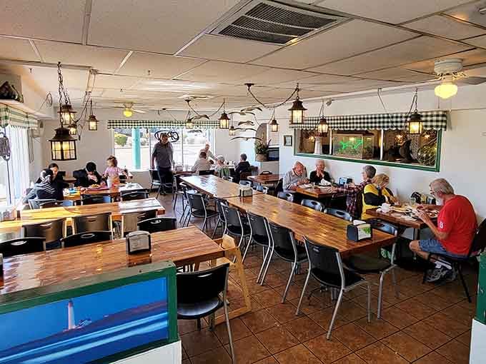 Long communal tables filled with happy diners prove that great seafood brings people together, no ocean required.