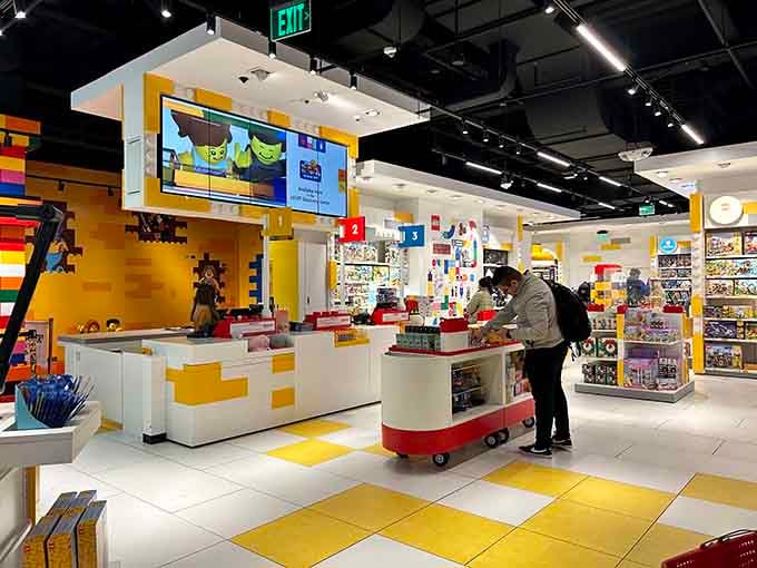 The checkout counter designed like LEGO bricks, making it nearly impossible to leave without one more set.