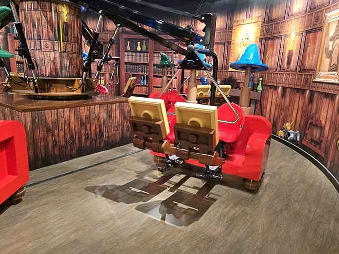 Merlin's ride awaits, where pedal power lifts you skyward for aerial views of brick-built wonders below.