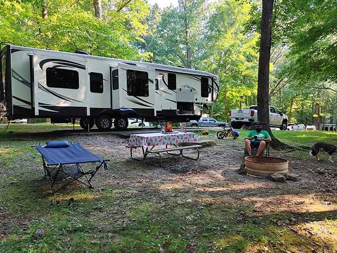 RV camping with hookups, proving you can love nature while still having air conditioning and satellite TV.