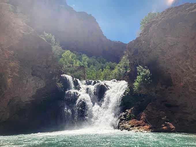 Sunlight hitting the falls creates this magical effect that makes every photo look like a postcard from paradise.