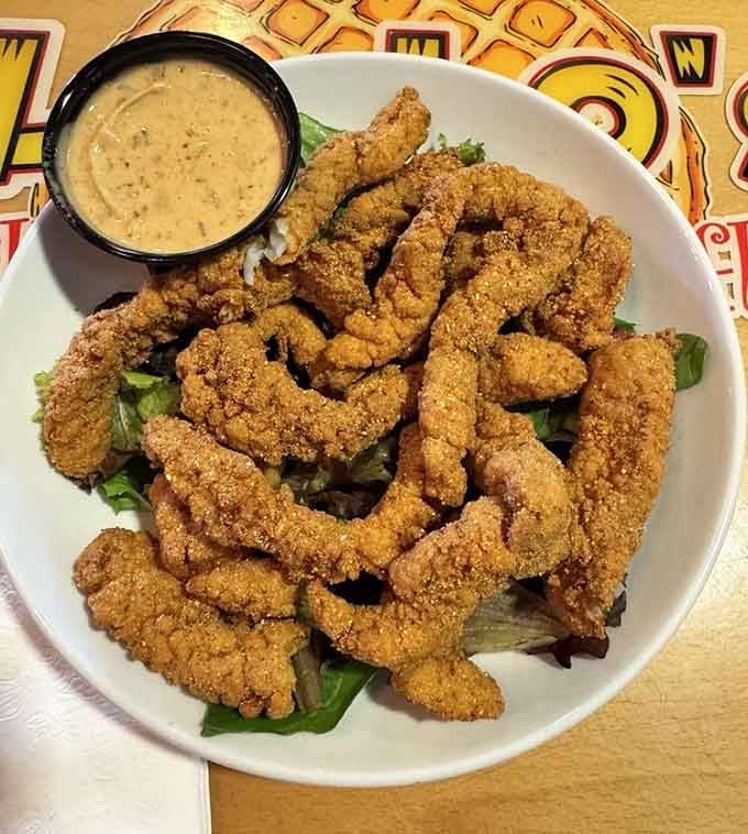 Catfish strips with a cornmeal coating that crunches louder than your favorite potato chip commercial.