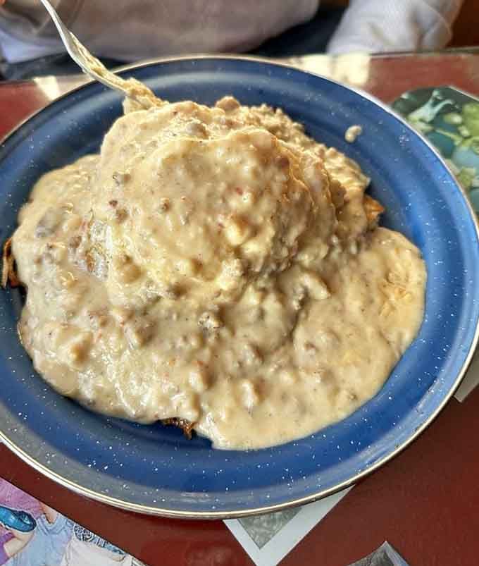 Biscuits and gravy so comforting, they should come with a blanket and a permission slip to skip adulting today.