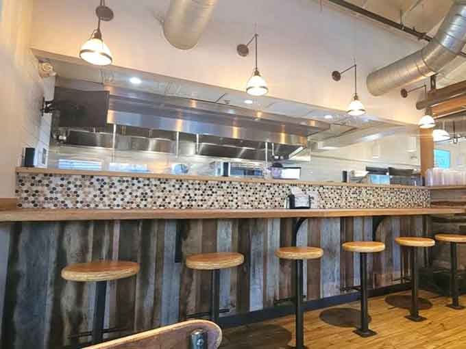 Counter seating with a view into the kitchen &ndash; because watching your breakfast being made is half the fun.