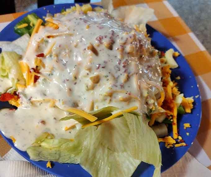 When your salad looks this loaded, you can pretend you're being healthy before dessert round two.