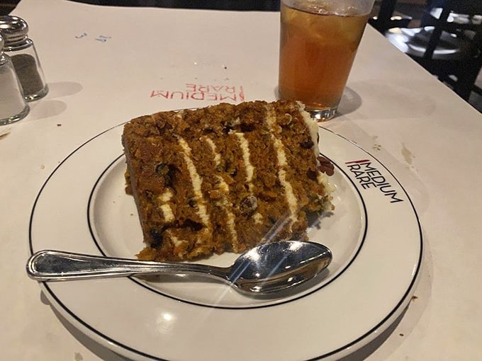 That towering slice of carrot cake with cream cheese frosting could make a rabbit reconsider its entire dietary philosophy.