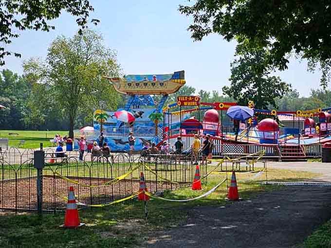 Classic fairground rides clustered together like old friends reuniting, each one promising thrills without the corporate polish or price tag.