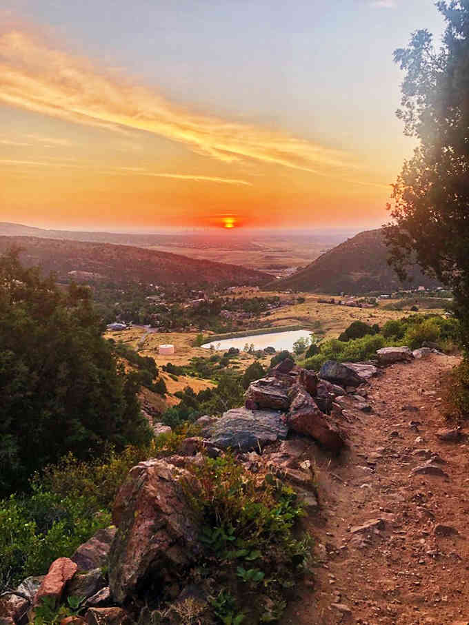 Sunset from Mount Falcon turns the landscape into a painting that no camera can quite capture properly.