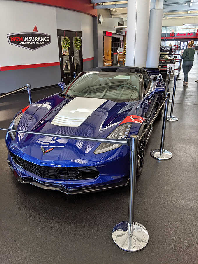 That deep blue beauty with racing stripes could make even your sensible sedan feel inadequate in the parking lot.