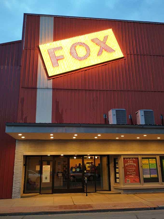 The Fox Playhouse's vintage marquee glows like a beacon for anyone who misses when entertainment meant leaving the house.