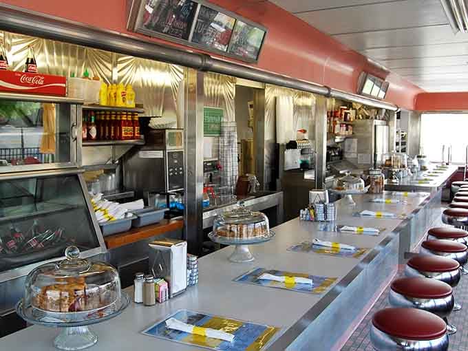 Counter seating where you can watch breakfast magic happen while pretending you're in a Norman Rockwell painting.