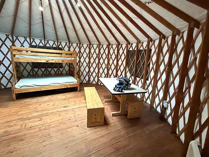 Yurt camping with bunk beds, proving roughing it doesn't always mean sleeping on rocks and regret.