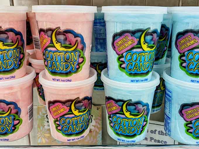 Cotton candy in pastel tubs, because sometimes you need your sugar in cloud form for maximum nostalgic impact.