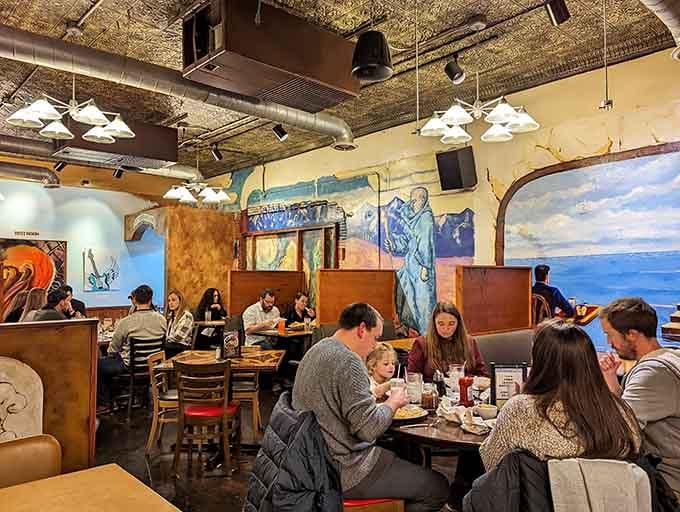 Colorful murals and happy diners create the kind of atmosphere where strangers become friends over good food.