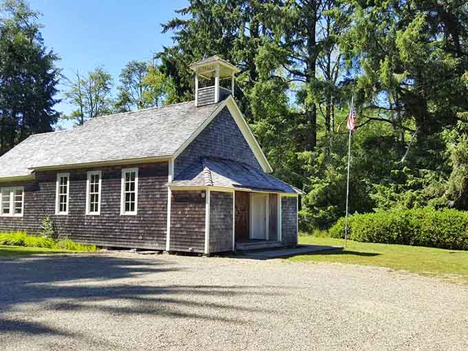 The old schoolhouse stands ready, as if students might return any minute for lessons.