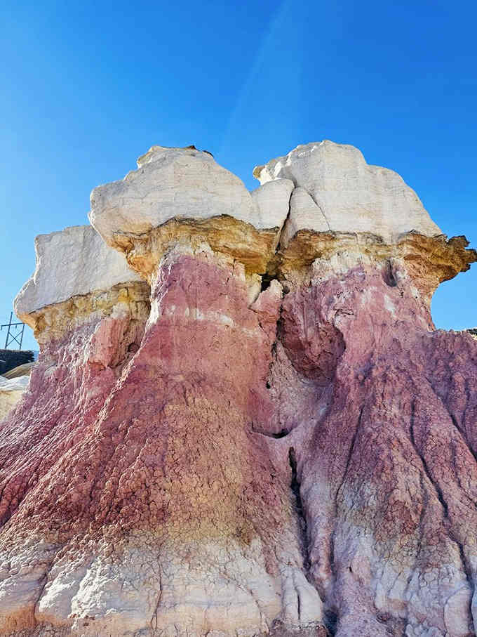 White hoodoos clustered together like they're having a very important meeting about erosion patterns and weekend plans for millennia ahead.