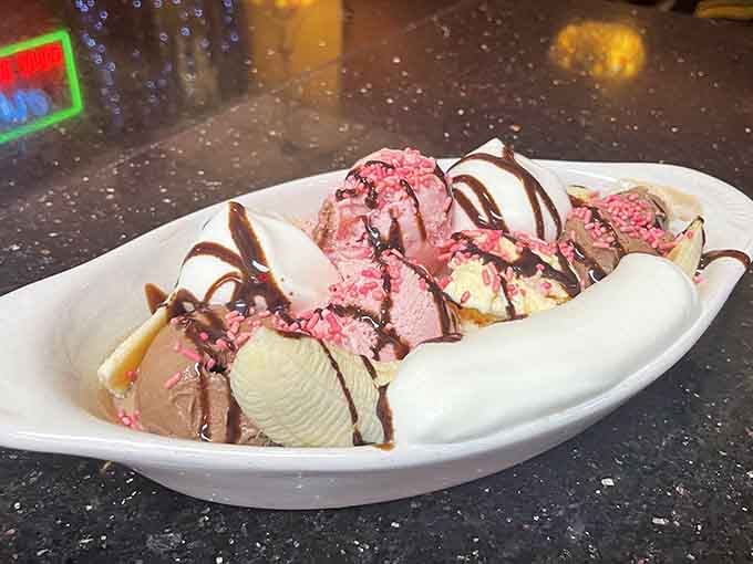 A banana split drizzled with chocolate sauce proves some classics never go out of style for good reason.