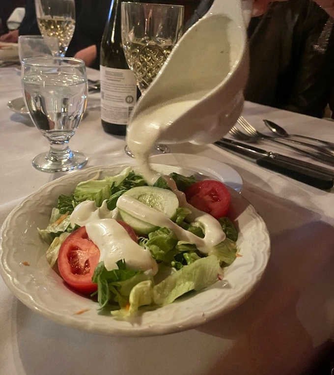 Fresh salad with crisp vegetables because even steakhouses know balance matters, at least a little bit anyway.