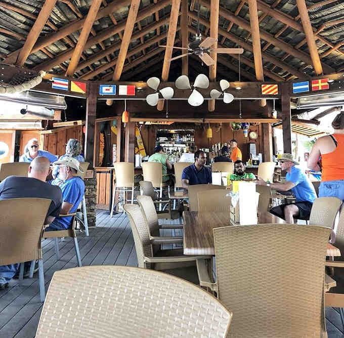 Ceiling fans, tropical vibes, and diners who've discovered that vacation mode works any day of the week.
