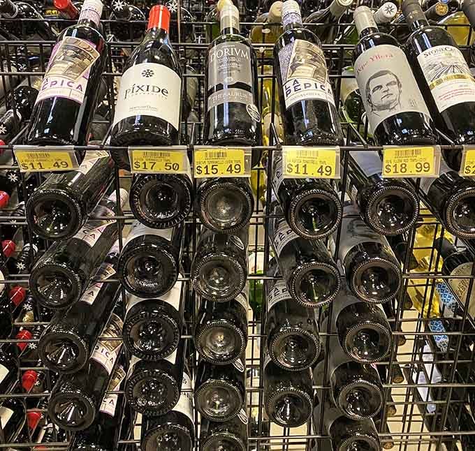 Wine bottles stand at attention, offering liquid accompaniment from regions that take their grapes very seriously indeed.