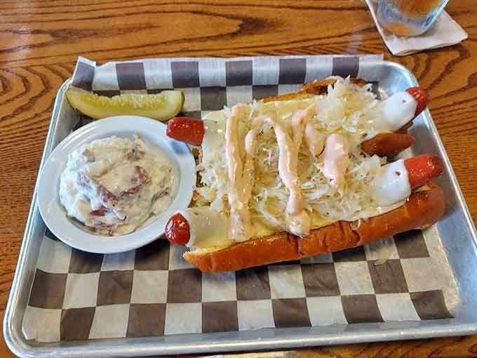 Hot dogs topped with sauerkraut and swagger, proving frankfurters deserve respect and proper condiments always.