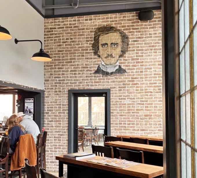 Edgar's brooding gaze watches over diners from the brick wall, silently approving of every burger ordered below.