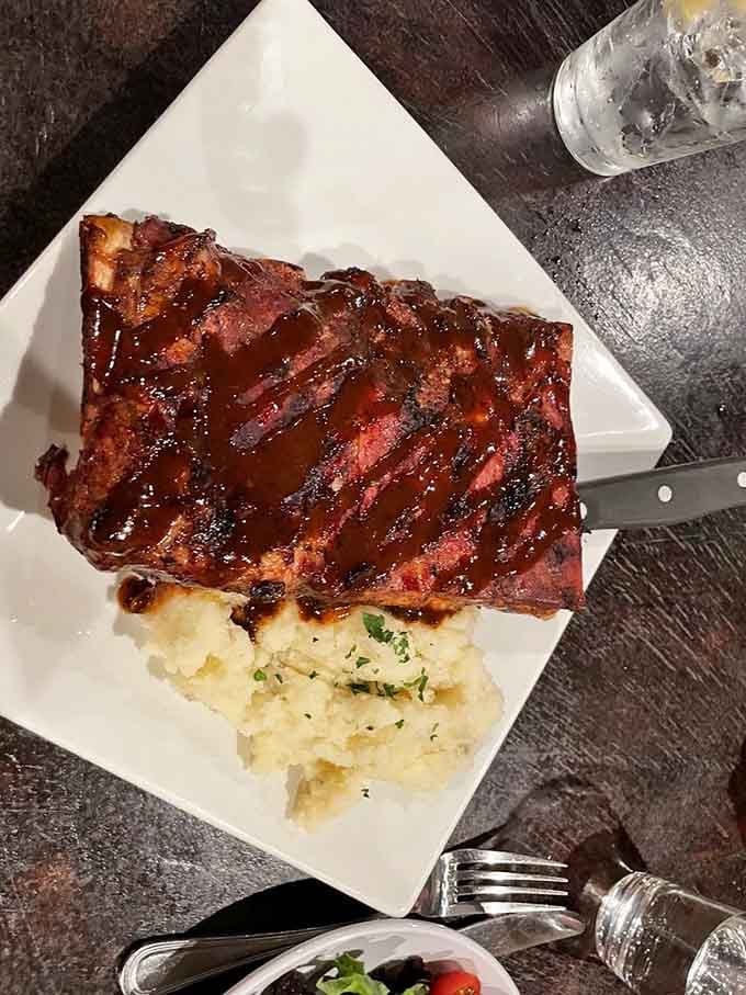 Ribs glazed to sticky perfection, the kind that require extra napkins and zero shame about the mess.
