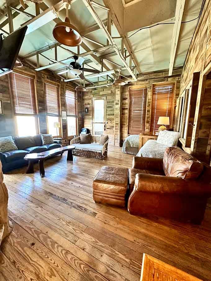 Leather furniture and soaring ceilings create a space that's equal parts sophisticated lodge and ultimate hangout spot.