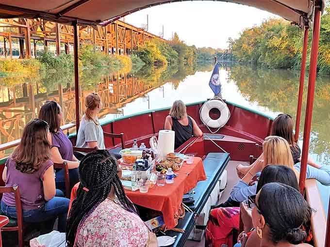 Happy passengers cruise toward the James River, experiencing that rare moment when everyone puts down their phones and just looks around.