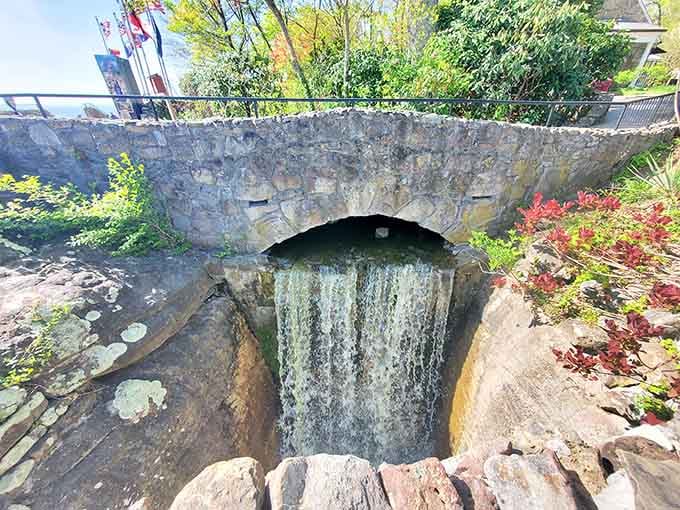 Water tumbles over ancient stone like liquid silver, creating nature's own fountain show without the electricity bill.