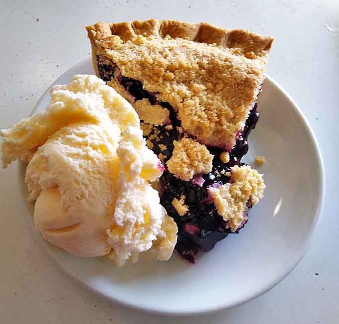 Blueberry pie with ice cream&mdash;the kind of dessert that makes you forget you just ate your weight in pancakes.