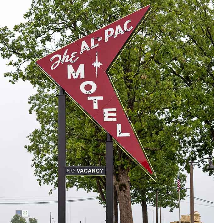 The Al-Pac Motel's arrow-shaped sign is pure 1950s geometry, pointing travelers toward affordable comfort and clean sheets.