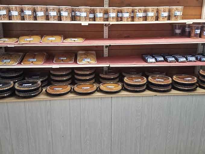 Shelves of pies and baked treats arranged like edible architecture, each one calling your name softly.